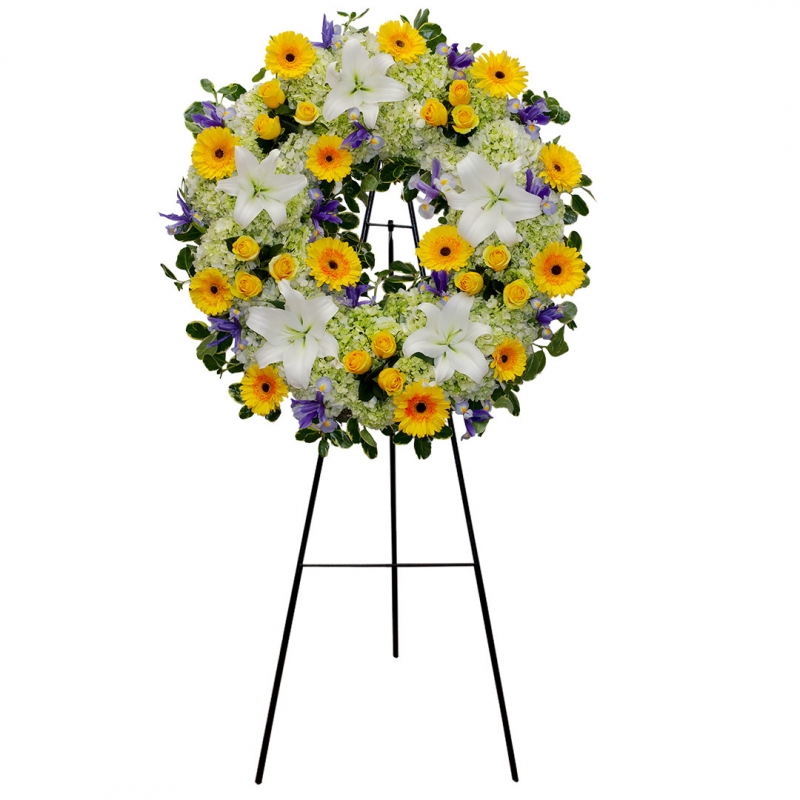 Corona de Rosas, Gerberas e Iris. Despide a un Ser Querido con Flores.